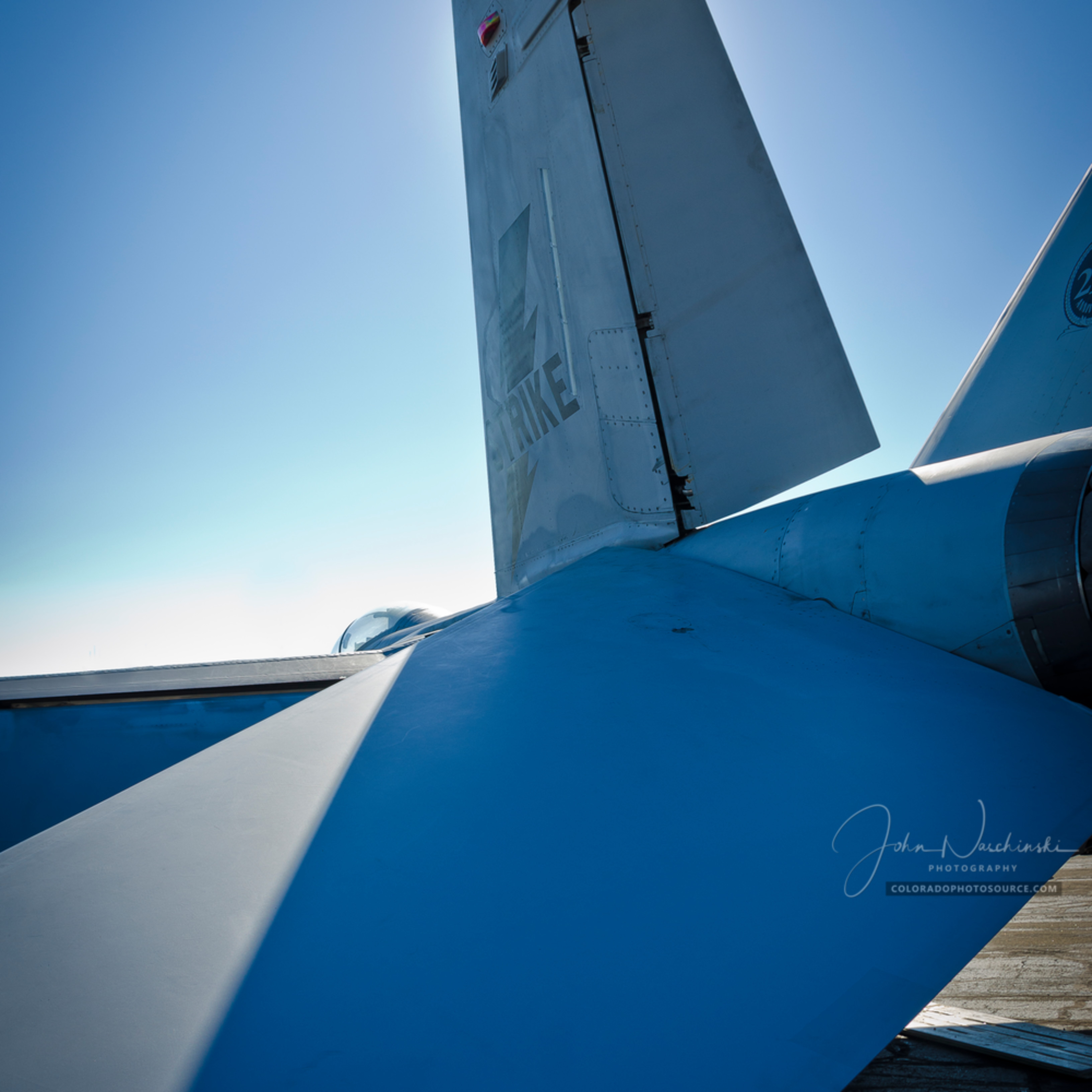 Photo of tail of McDonnell Douglas F-18 Hornet Combat Jet from Back