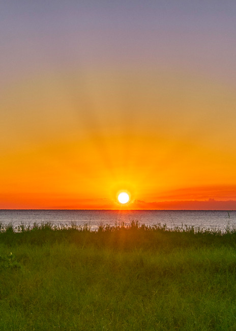 Sun out of the ocean on a clear day
