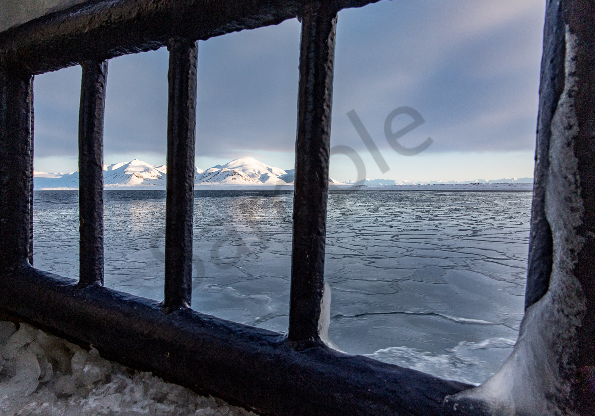 Window to Svalbard Mountains
